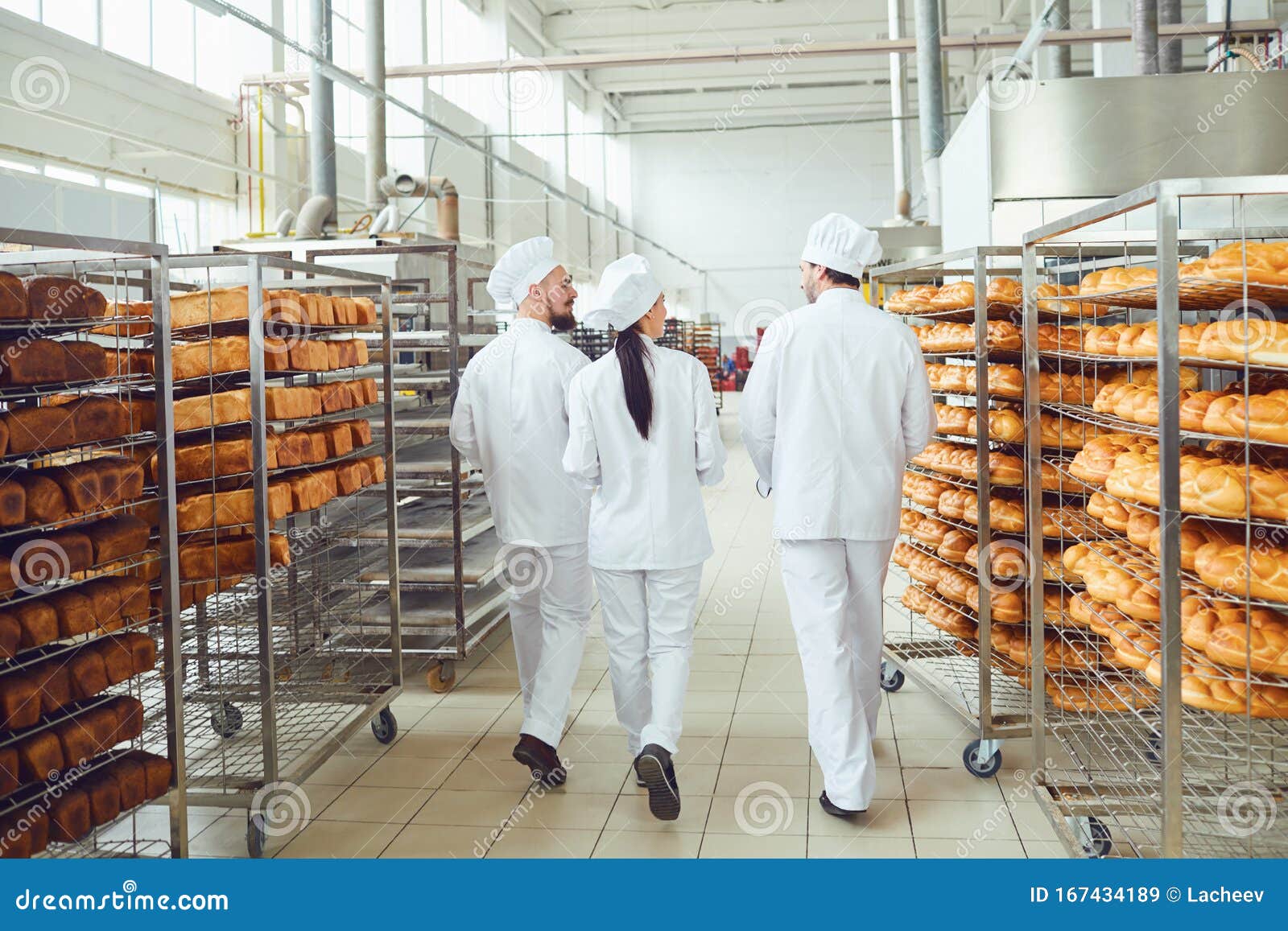 Bakers Team Goes in the Workshop Production of Bread. Stock Image ...
