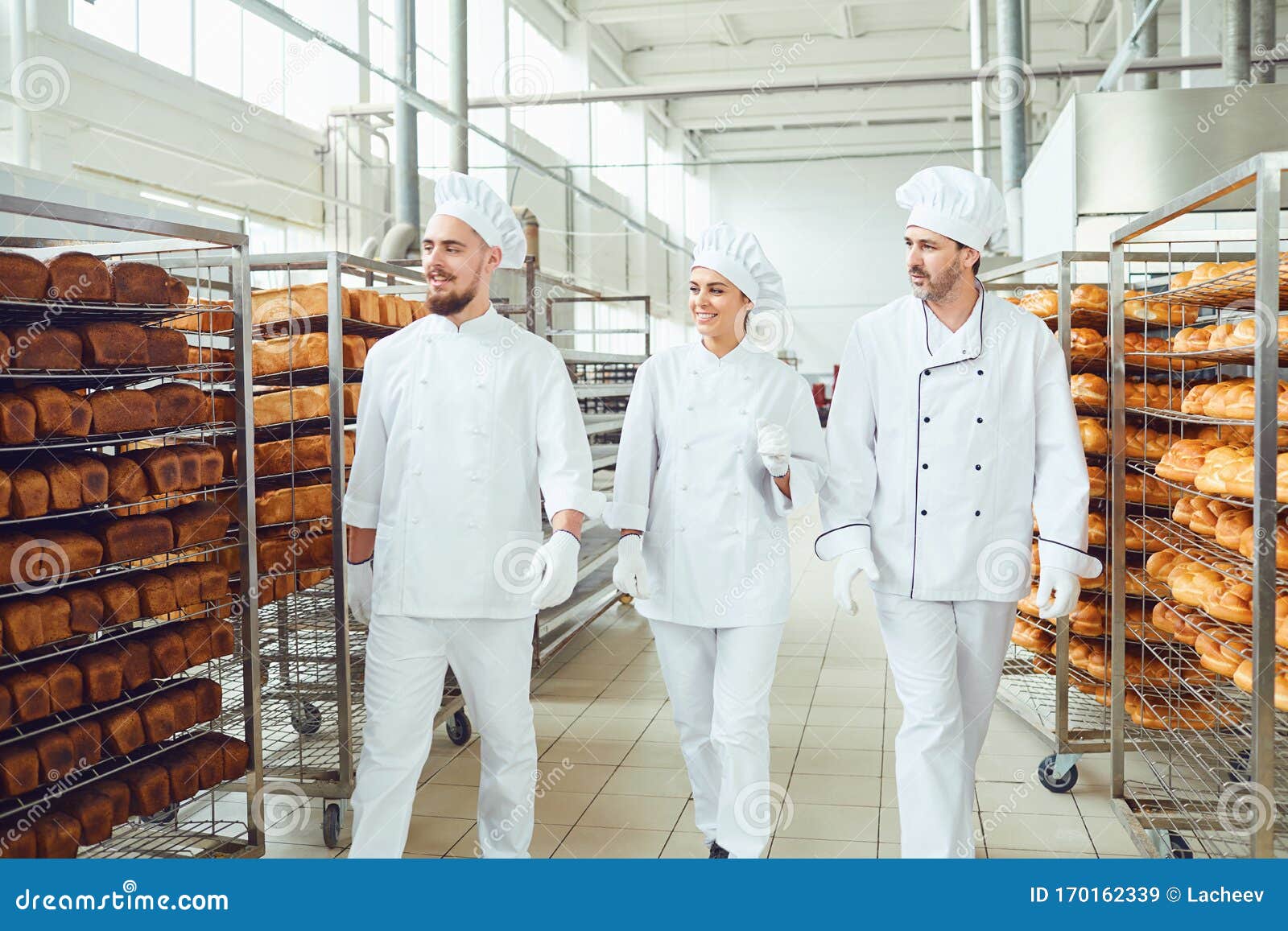 Bakers Team Goes in the Workshop Production of Bread. Stock Image ...