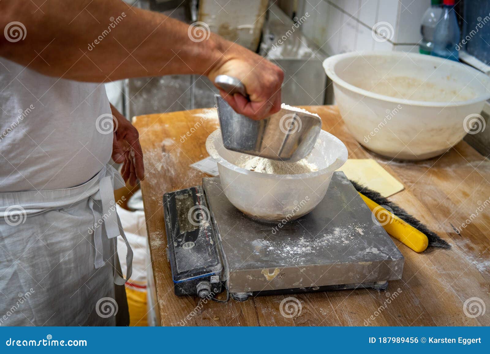 In Bakery a Baker Mixes the Ingredients for a Bread Dough Stock Photo ...