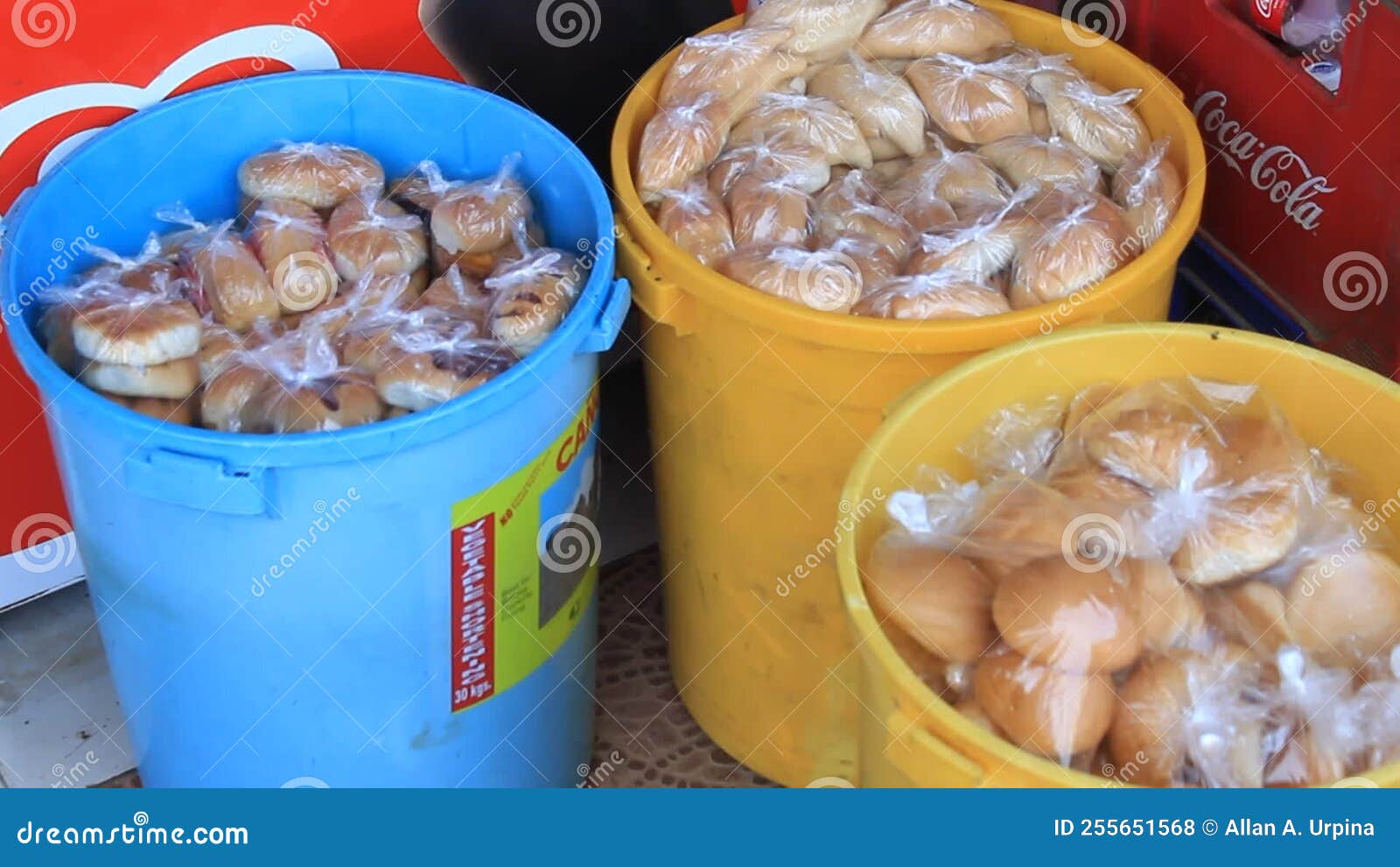 Three Big Plastic Bowel of Bunch of Different Bread on Tiny Store ...