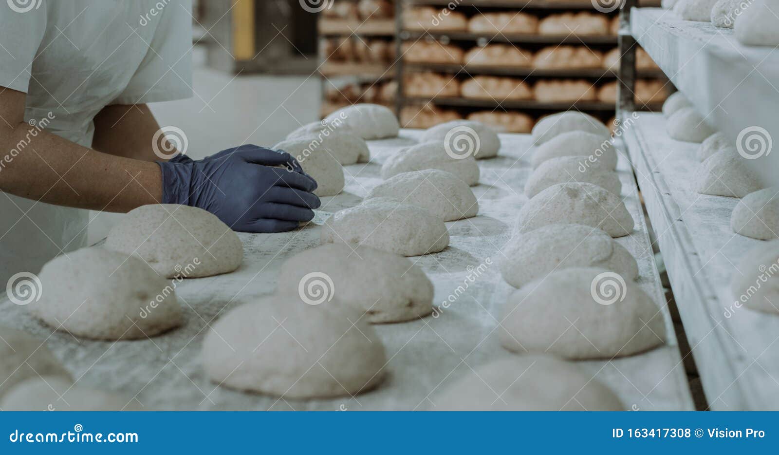 In The Bakery Commercial Kitchen Working Fast Bakers Forming Pieces Of ...