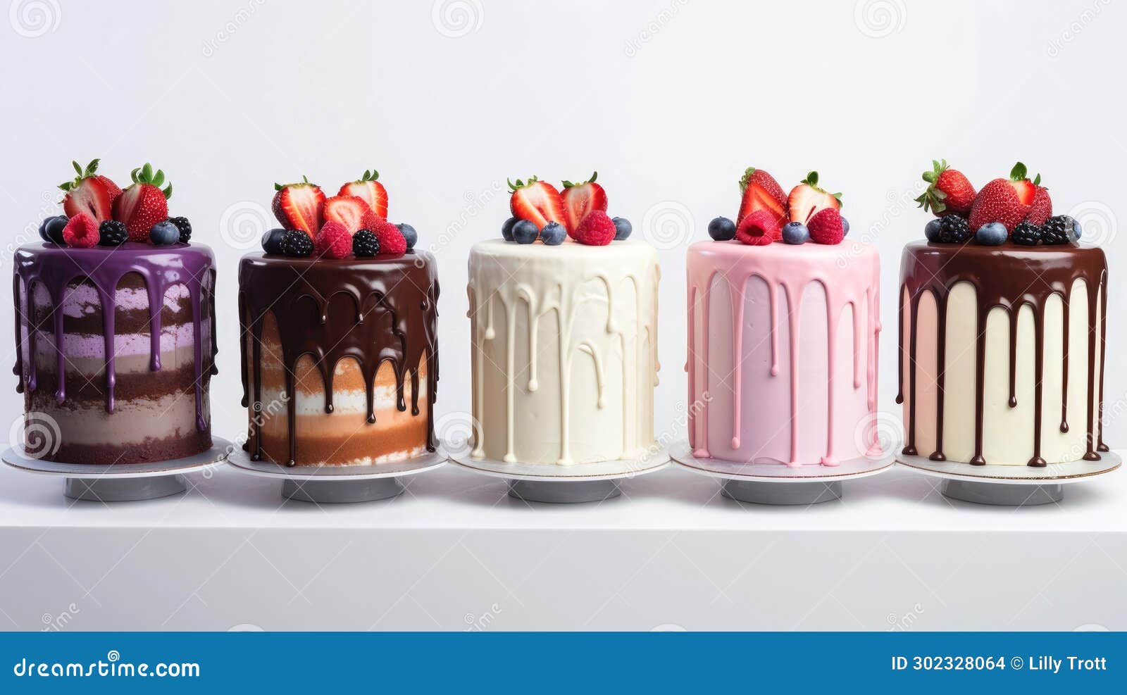 Bakery Concept. Five Different Layered Cakes on the White Table in a ...