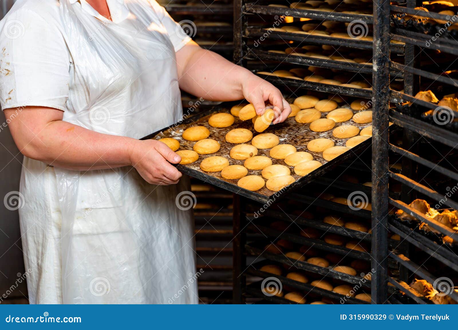 Bakery Production in Worker Hands. Delicious Pastry Baking Products ...