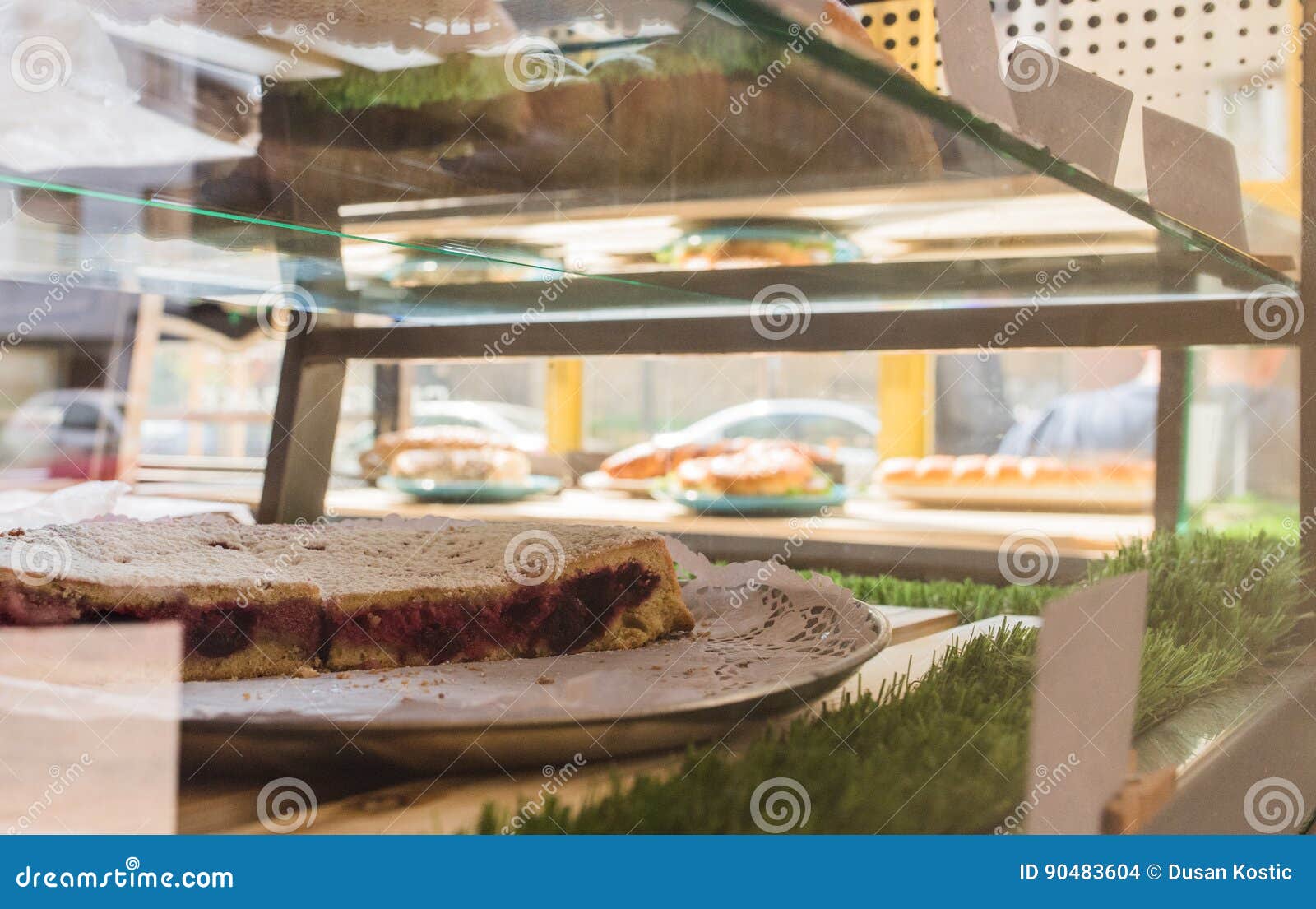 Bakery with Rolls, Cakes, and Pastries in a Bakery Window Display Stock ...