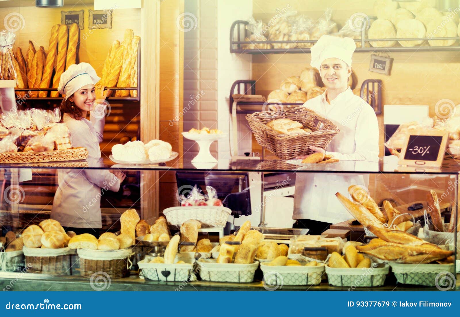 Bakery Staff Offering Bread and Different Pastry Stock Image - Image of ...