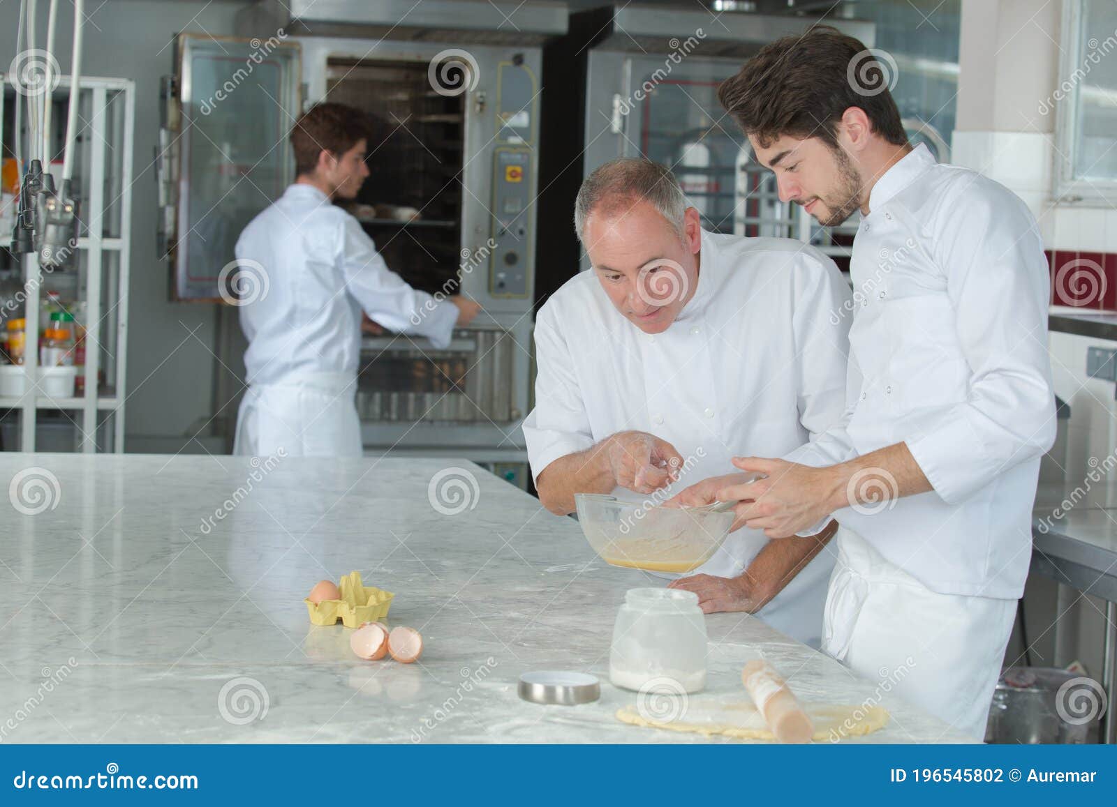 Bakery Teacher with Students in School Kitchen Stock Photo - Image of ...