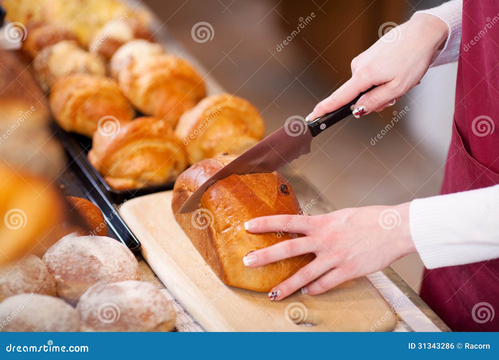 Bakery Worker Cutting Bread Loaf on Board Stock Photo - Image of fresh ...
