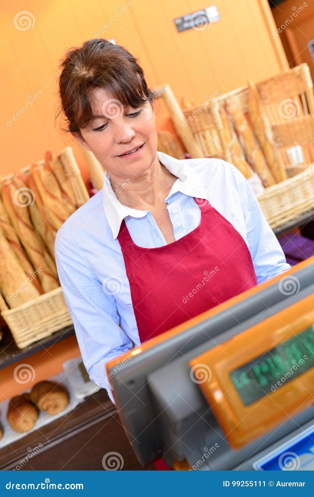 Bakery worker at till stock image. Image of female, girl - 99255111