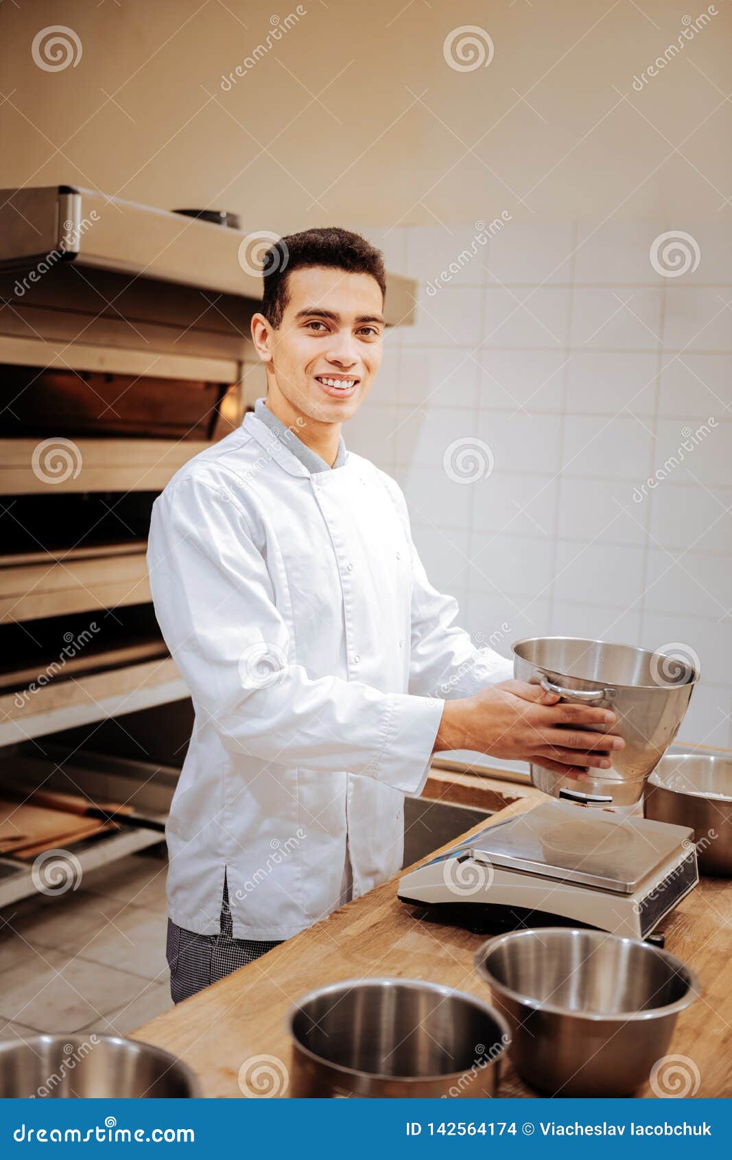 Young Skillful Baker Having His First Day in the Bakery Stock Photo ...
