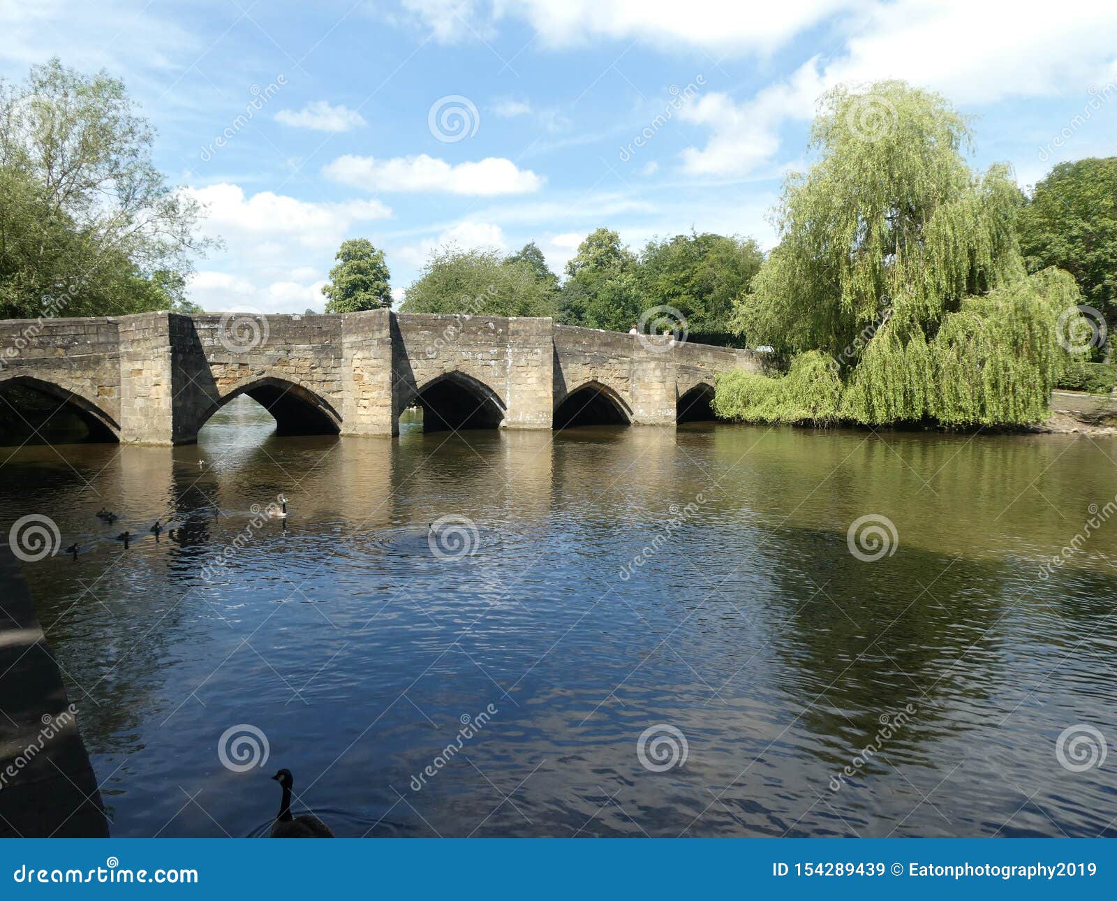 Bakewell bridge in the sun stock image. Image of water - 154289439