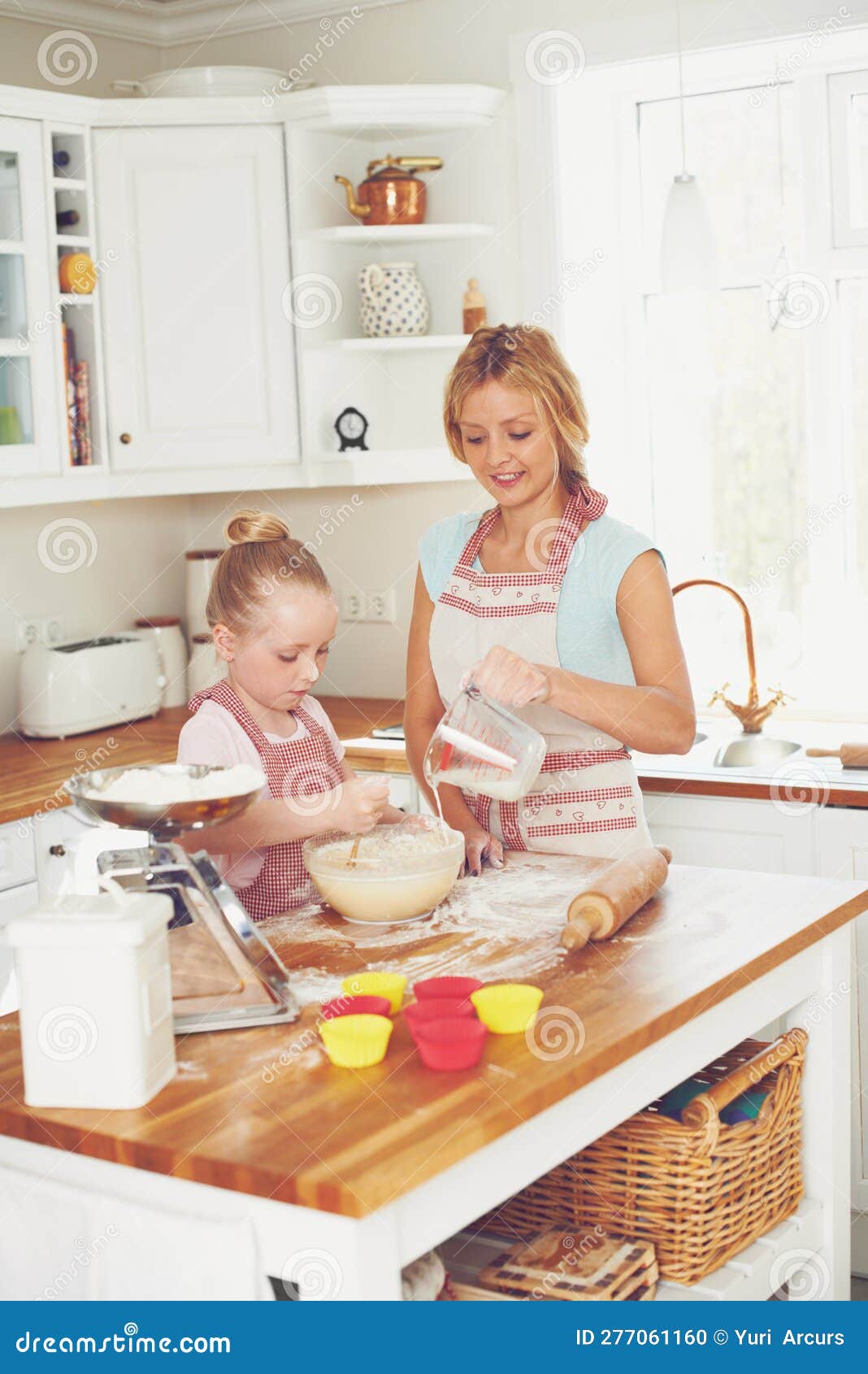 Baking is All about Teamwork. Cute Little Girl Baking in the Kitchen ...