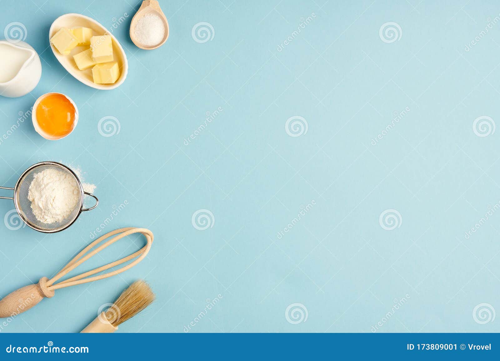 Baking Background with Whisk, Egg, Flour , Sugar, Butter on Blue Table ...