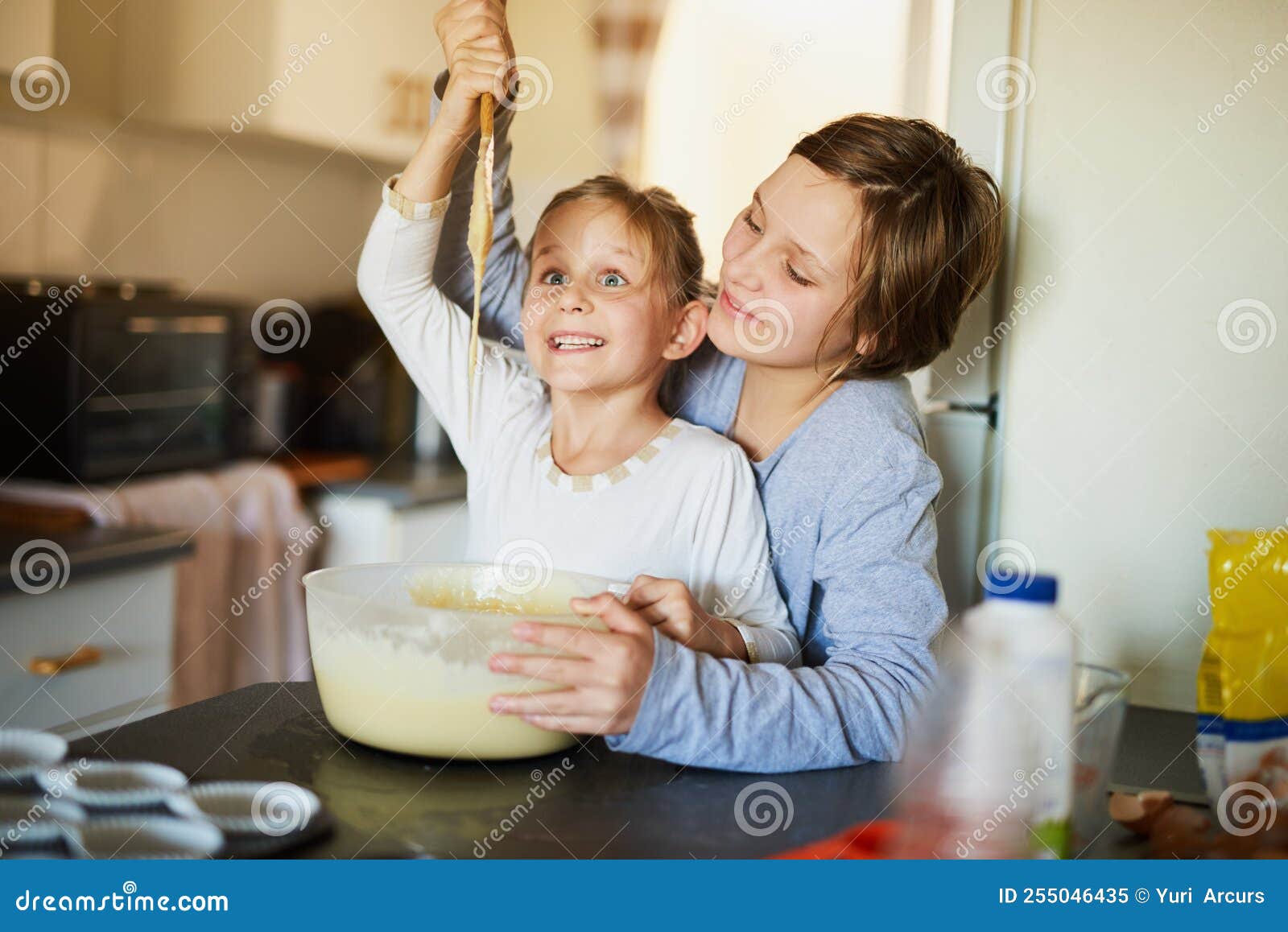 Baking is Bliss. Two Young Siblings Baking Together at Home. Stock ...