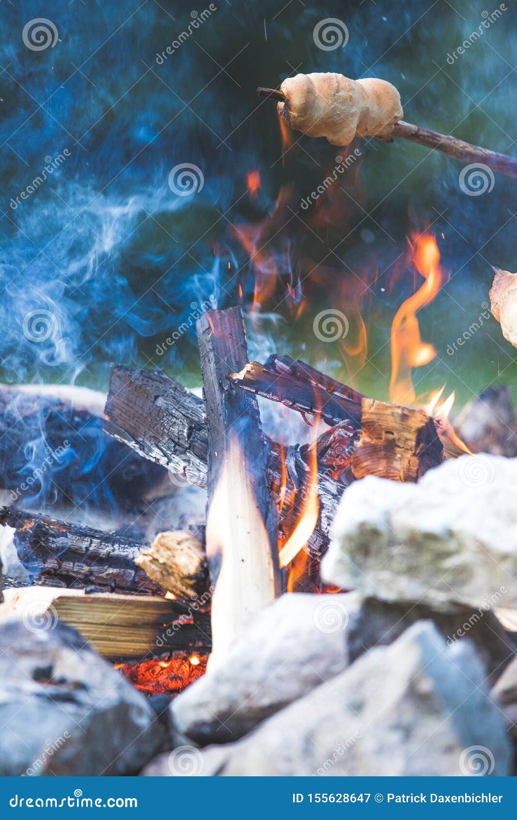 Baking Bread Over the Fire: Barbecue Outdoors with a Bonfire Stock ...