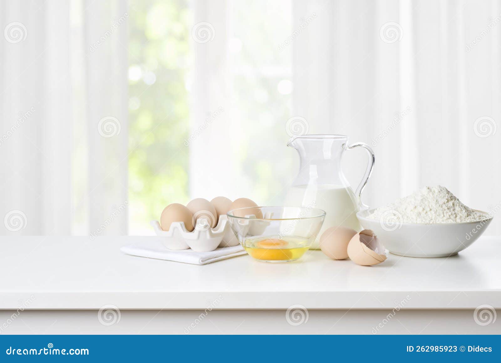 Baking Concept with Flour, Eggs and Milk on Kitchen Table Stock Image ...