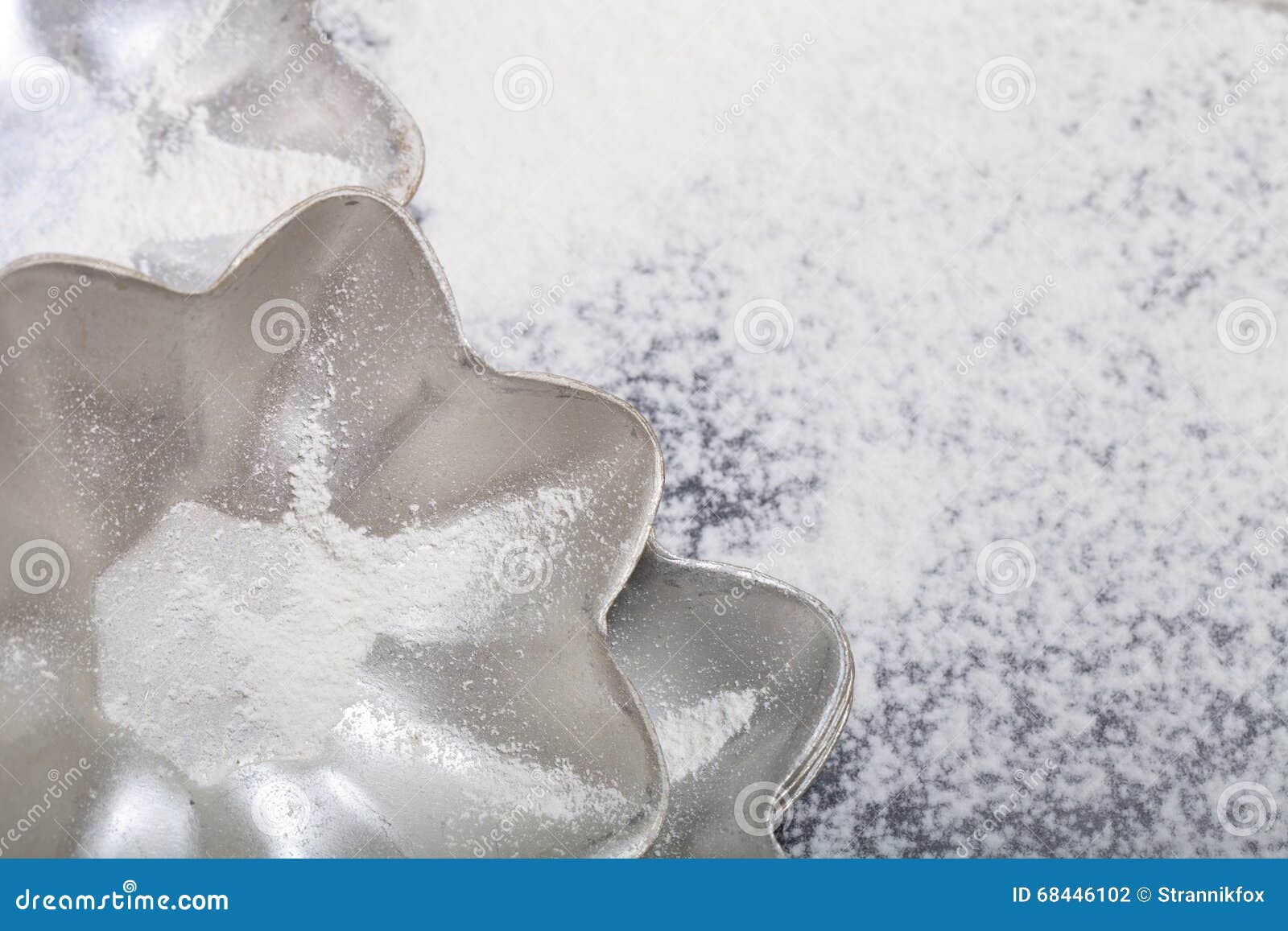 Baking Forms and Sprinkle Flour on Black Background Stock Photo - Image ...