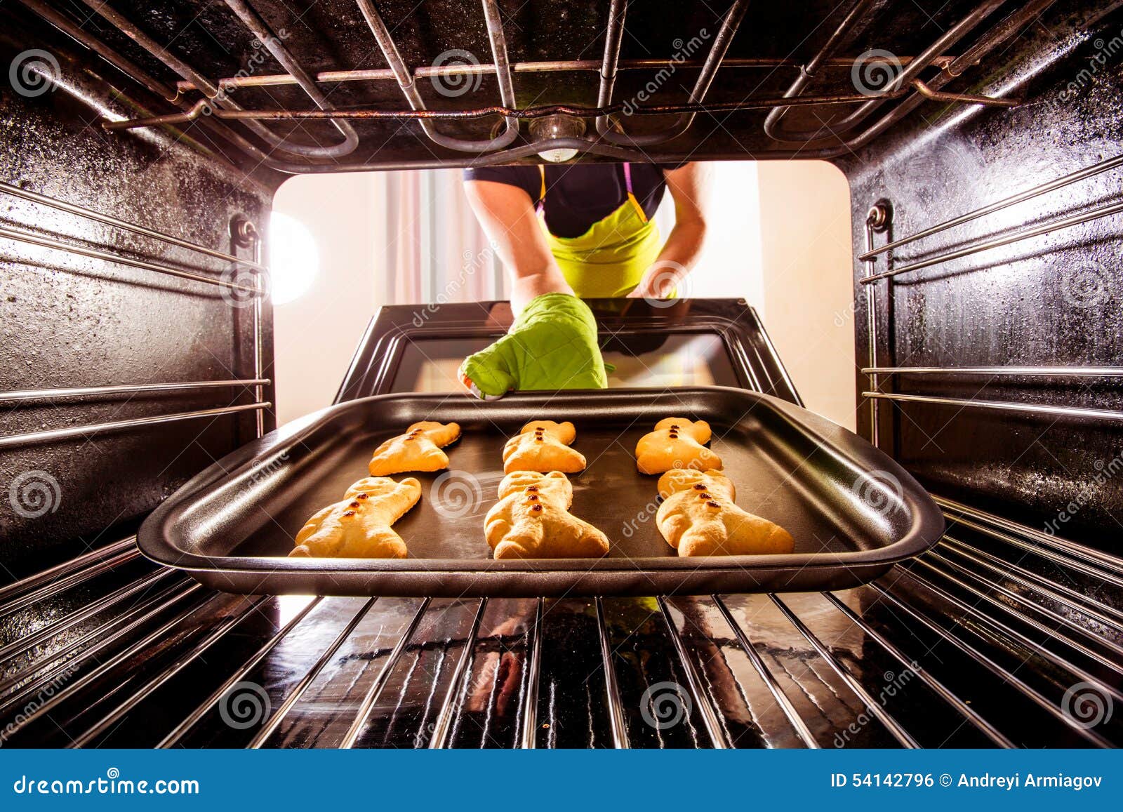 Baking Gingerbread Man in the Oven Stock Photo - Image of girl, cook ...