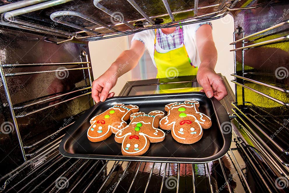 Baking Gingerbread Man in the Oven Stock Photo - Image of cupcake, home ...
