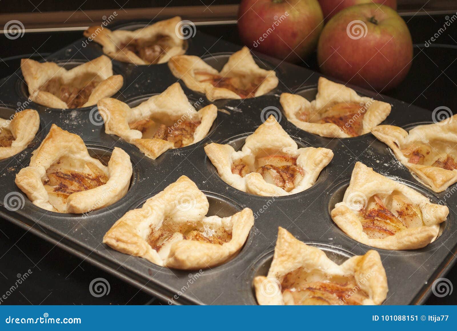 Baking Pan of Baked Biscuits Filled with Slices of Red Apples, Covered ...