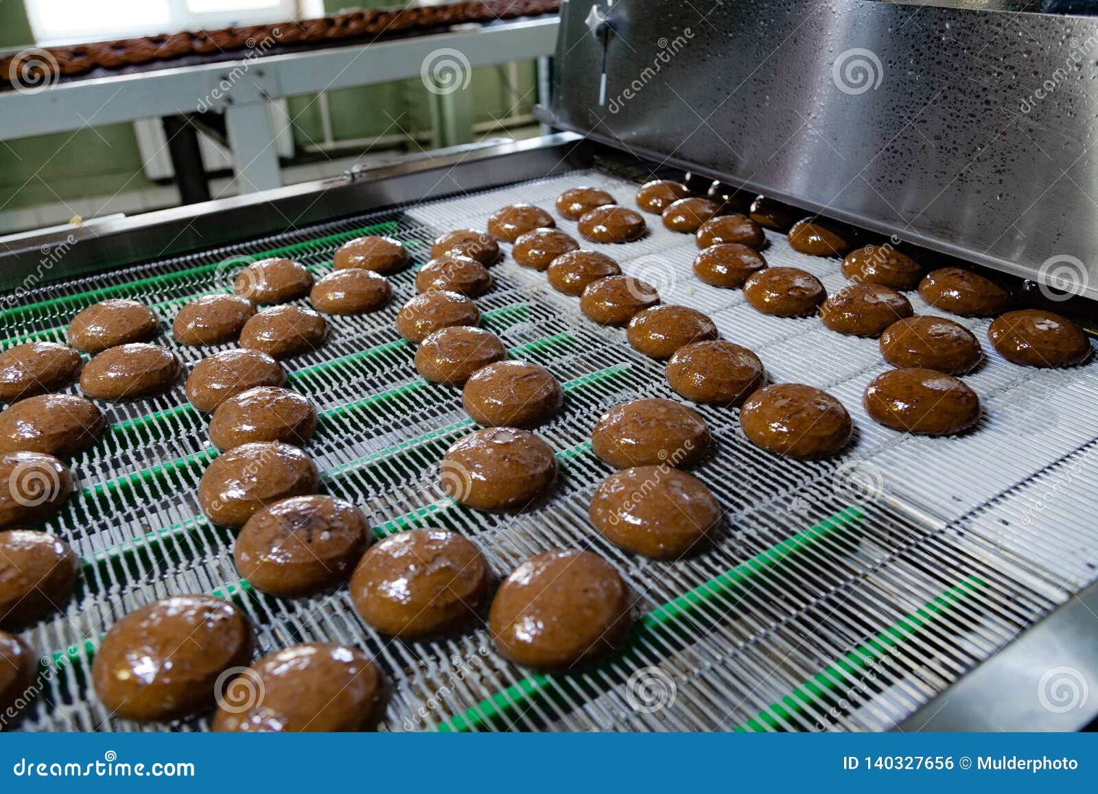Baking Production Line. Cookies after Glaze Coating Stock Photo - Image ...