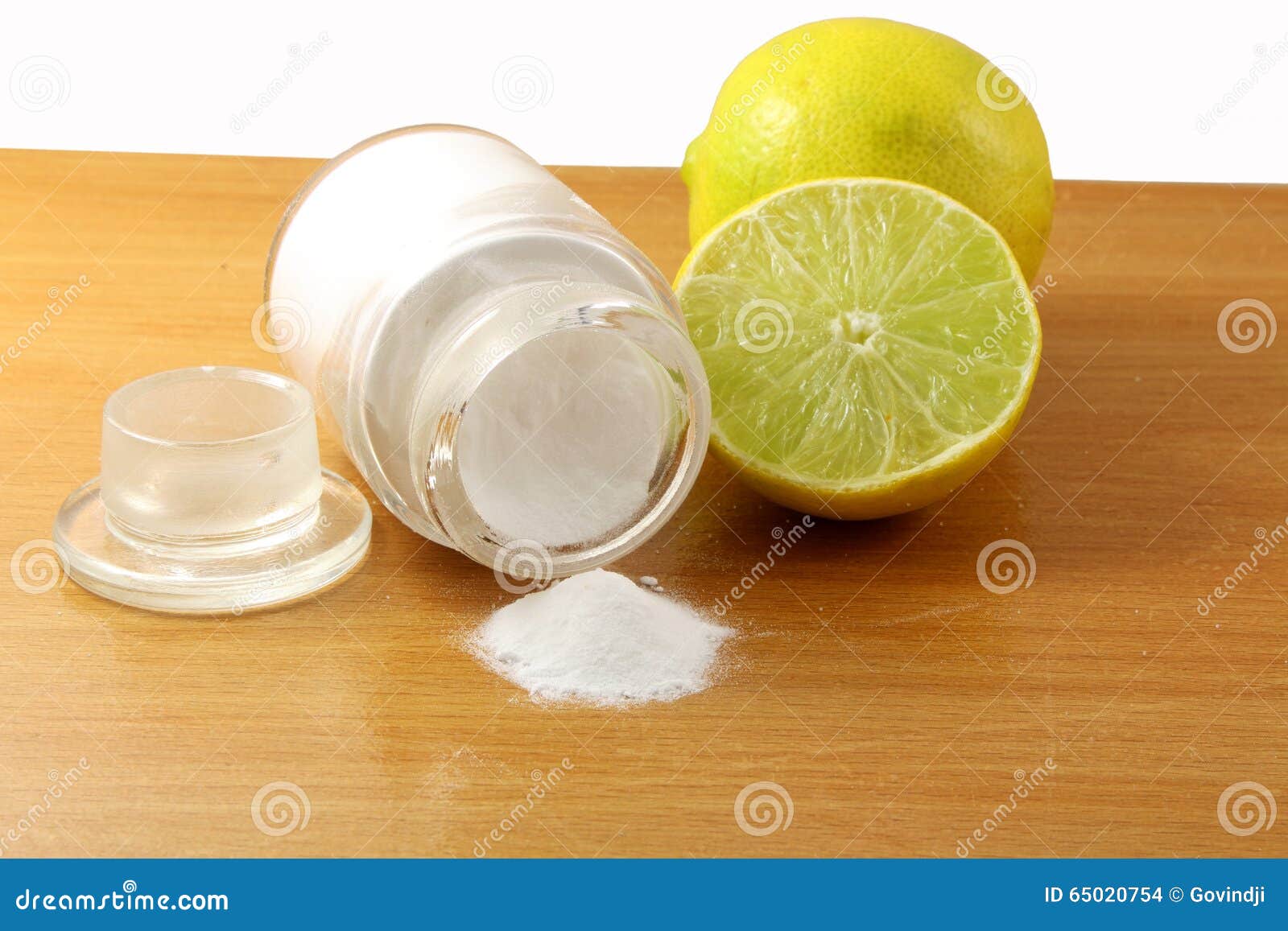 Baking Soda or Baking Powder in Glass Bottle with Lemon Fruit Stock ...