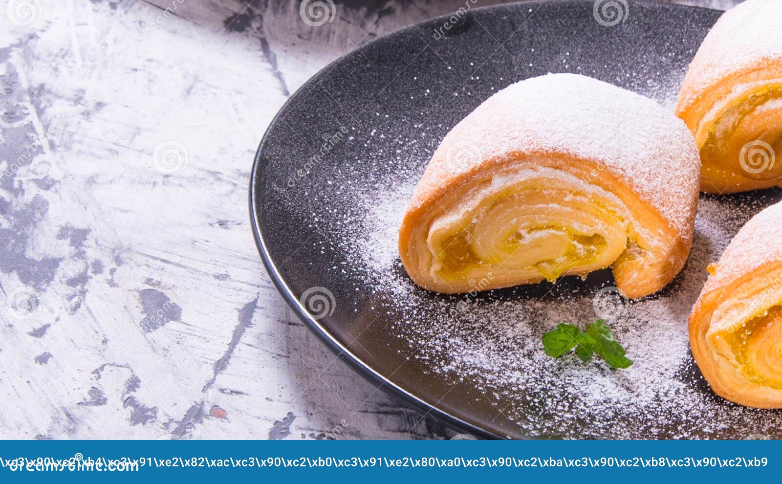 Baking Strudel,a Cake Powdered with Mint Leaves on a Black Plate on a ...