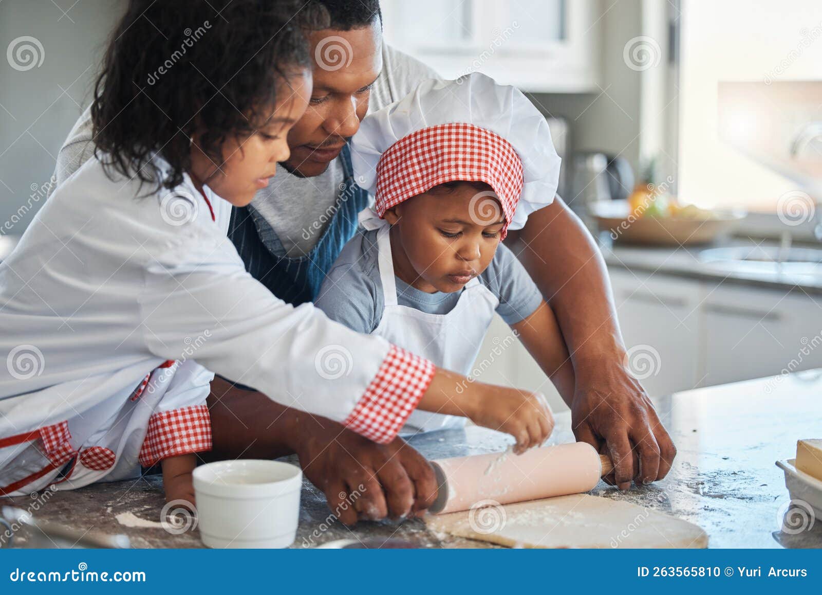 Baking with Your Children is a Benefit in Itself. a Father Baking at ...