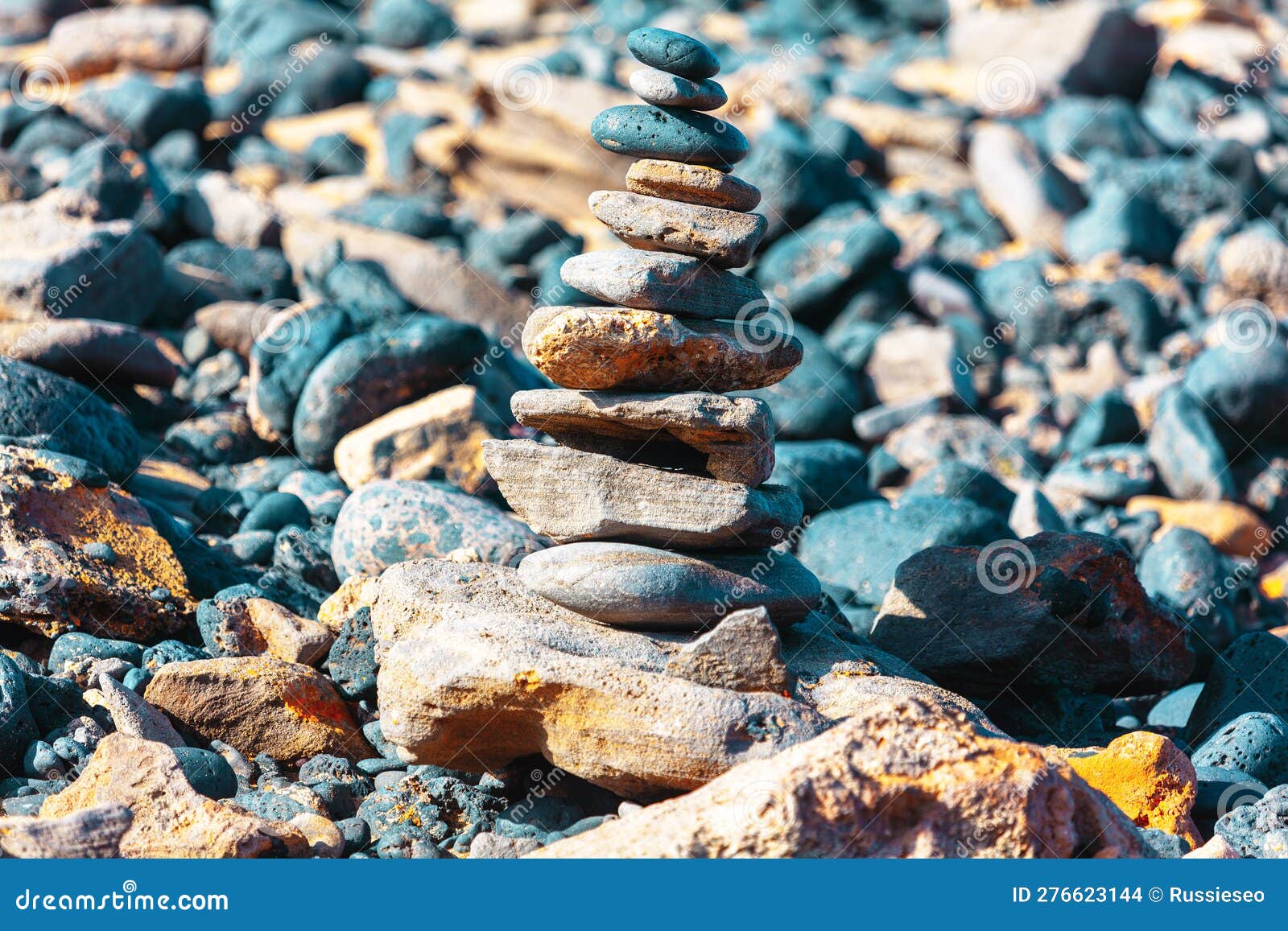 Balanced pebbles stock photo. Image of background, summer - 276623144