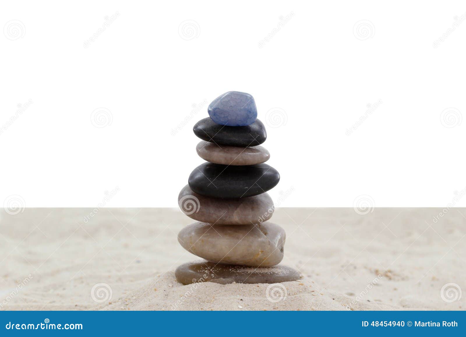 Balanced pebbles on sand stock photo. Image of stones - 48454940