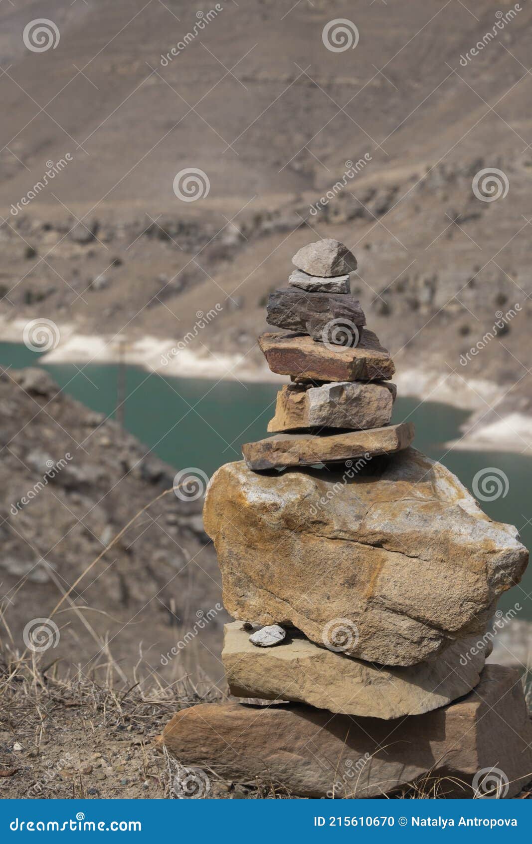 Balanced Rocks in the Mountains on the Background of a Blue Lake Stock ...