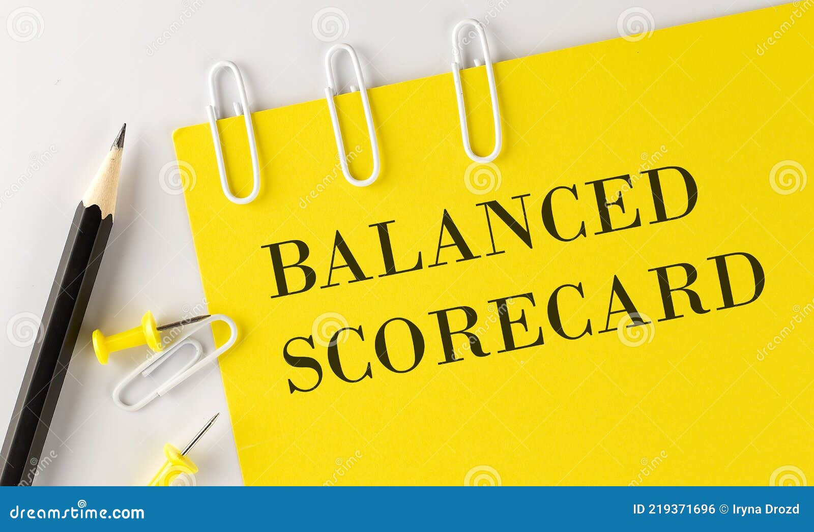 BALANCED SCORECARD Word on the Yellow Paper with Office Tools on White ...