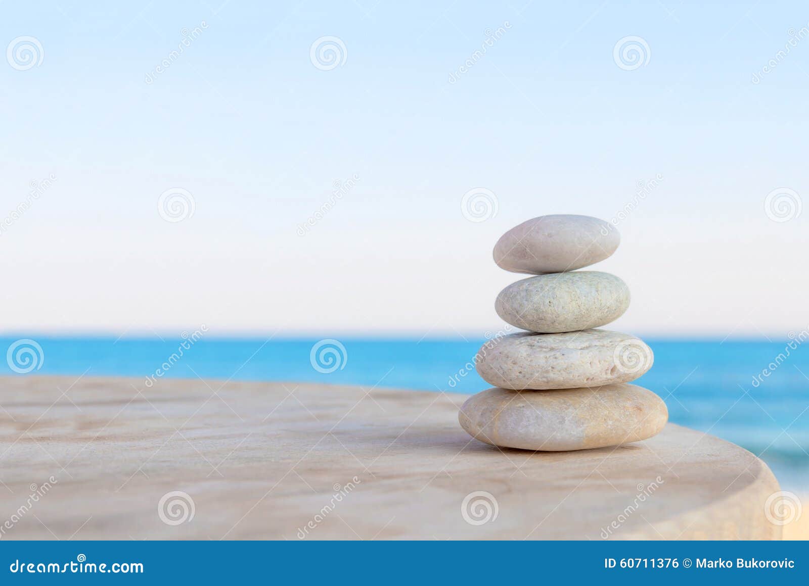 Balanced Several Zen Stones on Blurred Beautiful the Beach Background ...
