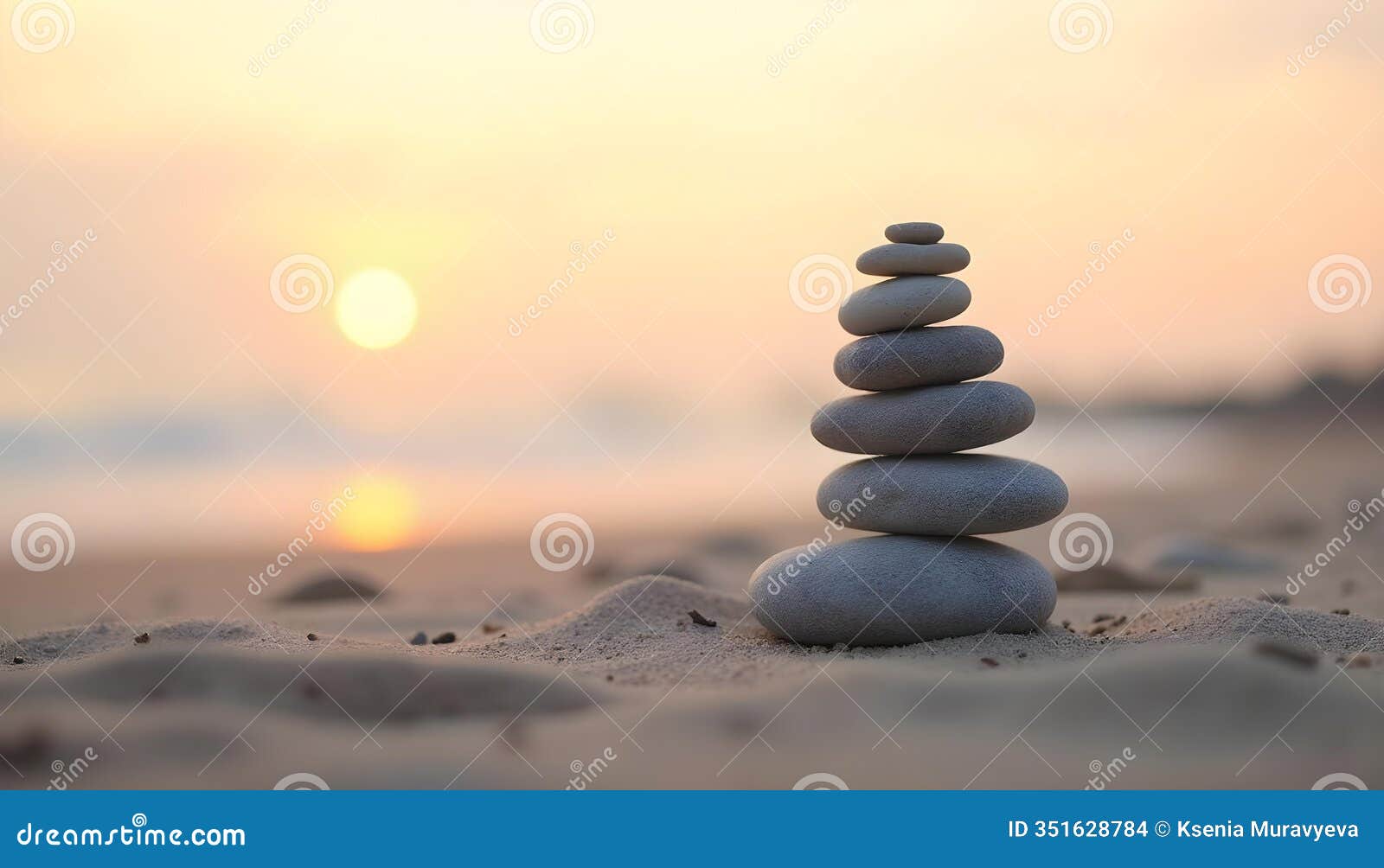Balanced Stack of Smooth Stones on a Sandy Beach Sunset with a Calm ...