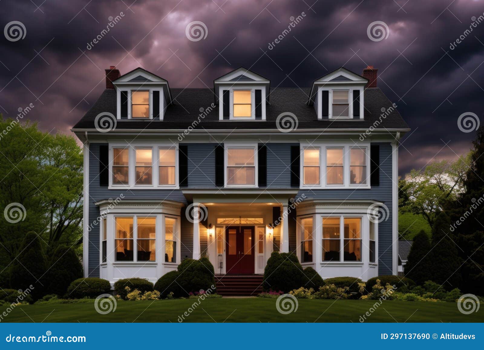 Balanced Windows of a Colonial Home Under Moody Clouds Stock Photo ...