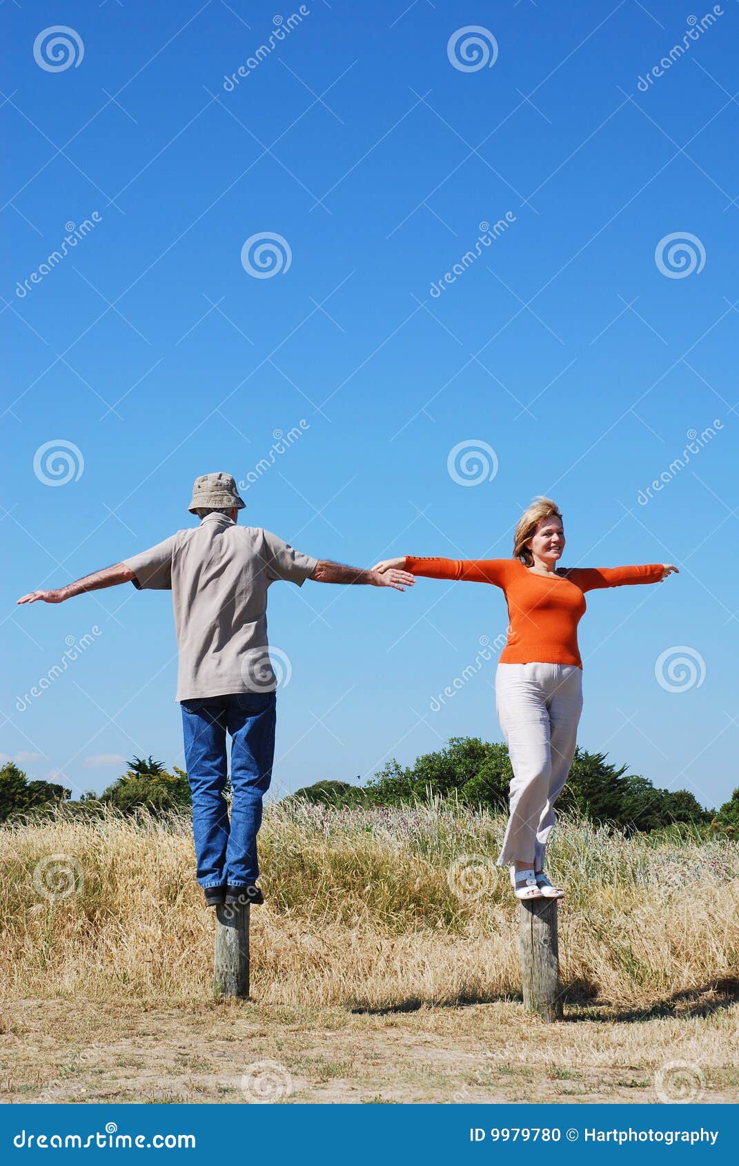 Balancing couple stock photo. Image of enjoying, adults - 9979780
