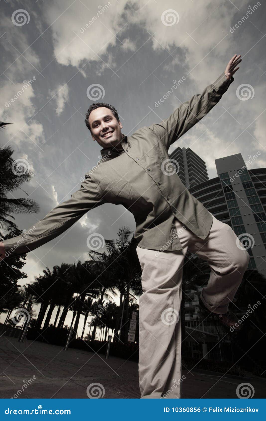 Balancing man stock photo. Image of dusk, twenties, person - 10360856