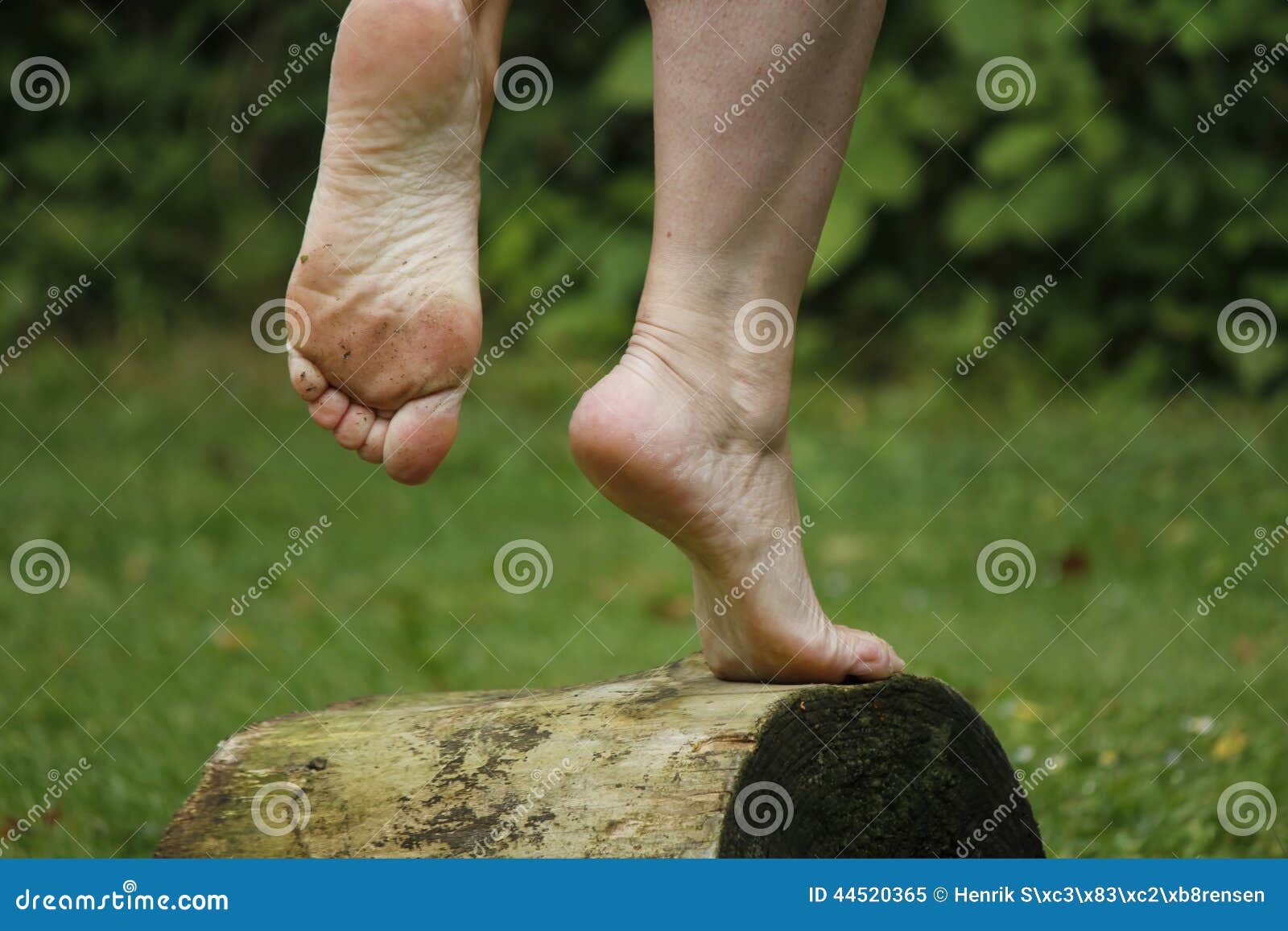 Balancing on one foot stock image. Image of toes, green - 44520365