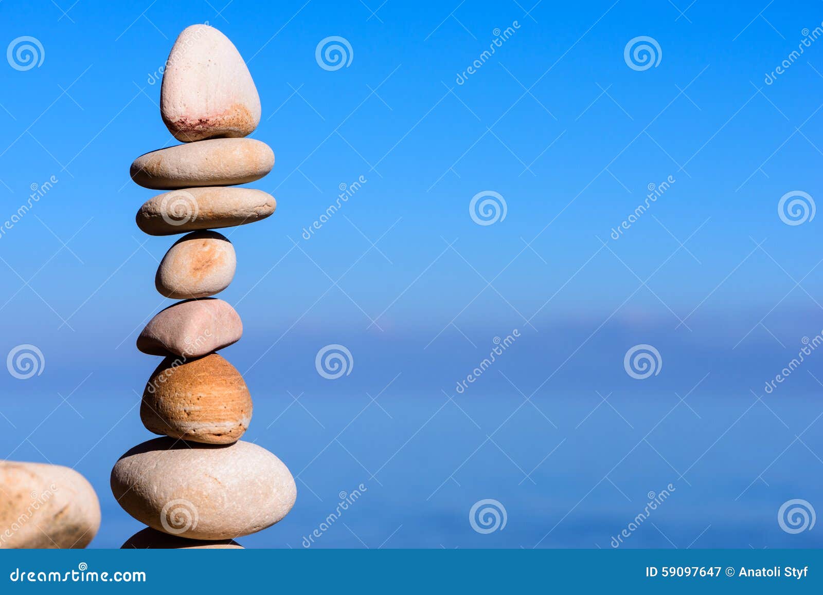 Balancing of pebbles stock image. Image of equal, equivalence - 59097647