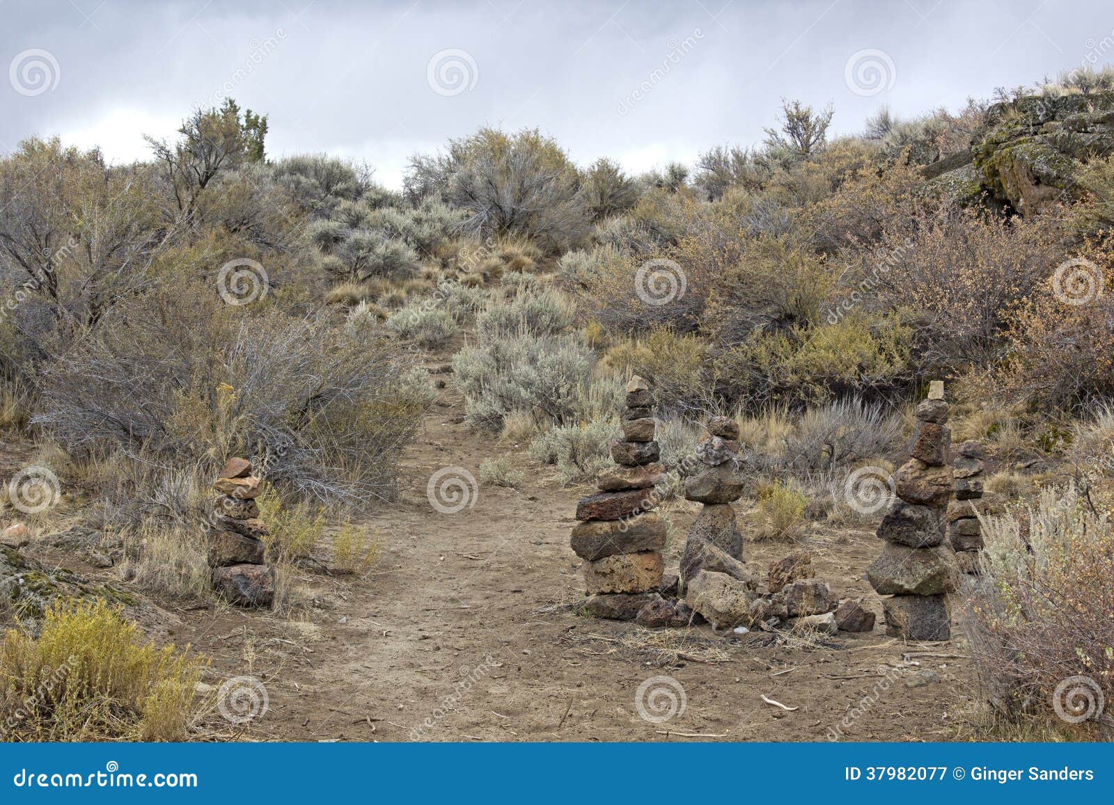 Balancing Rock Stacking on Trail in Desert Stock Image - Image of lava ...