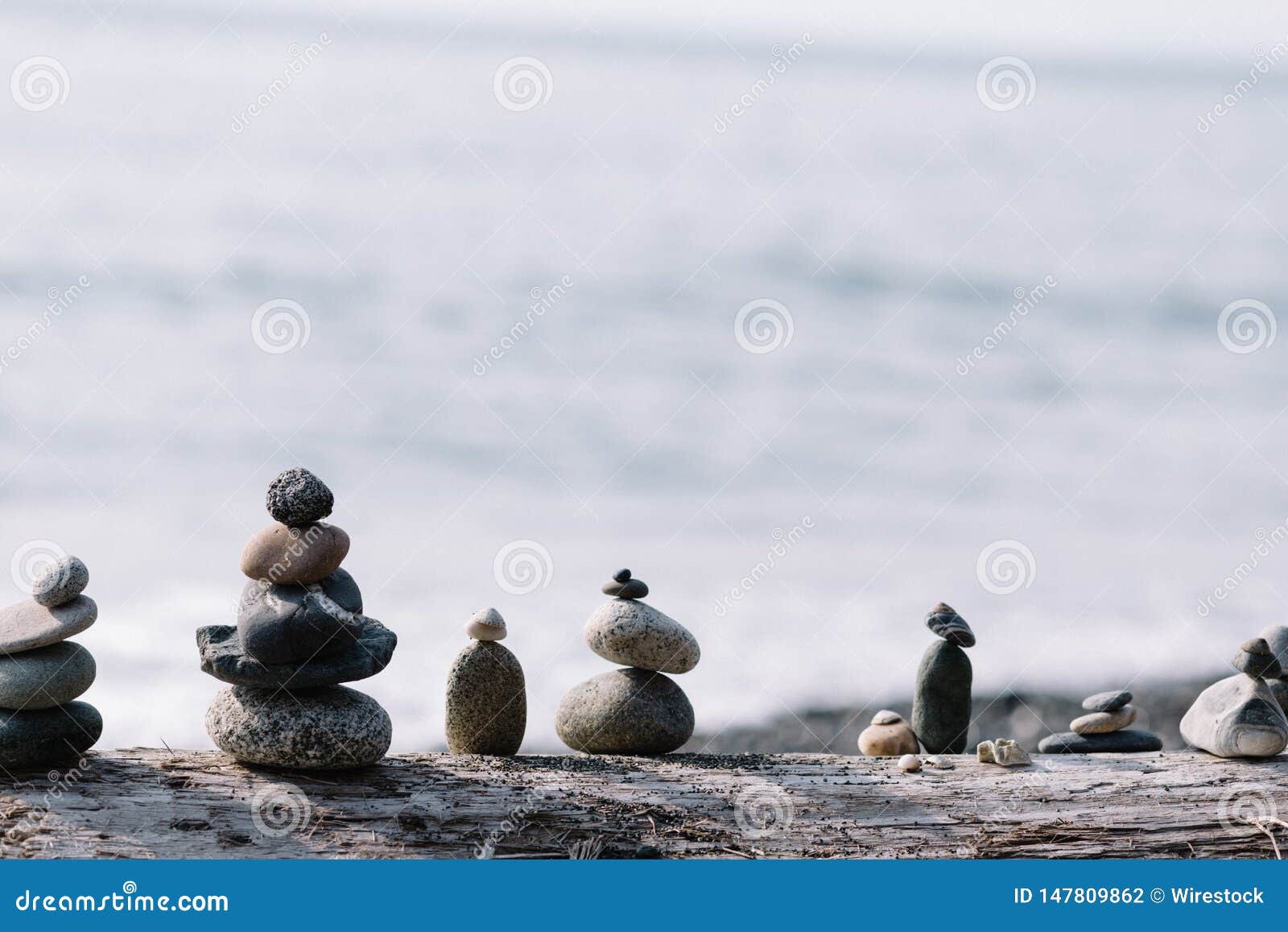 Balancing Rocks on Each Other at the Beach Stock Photo - Image of ...
