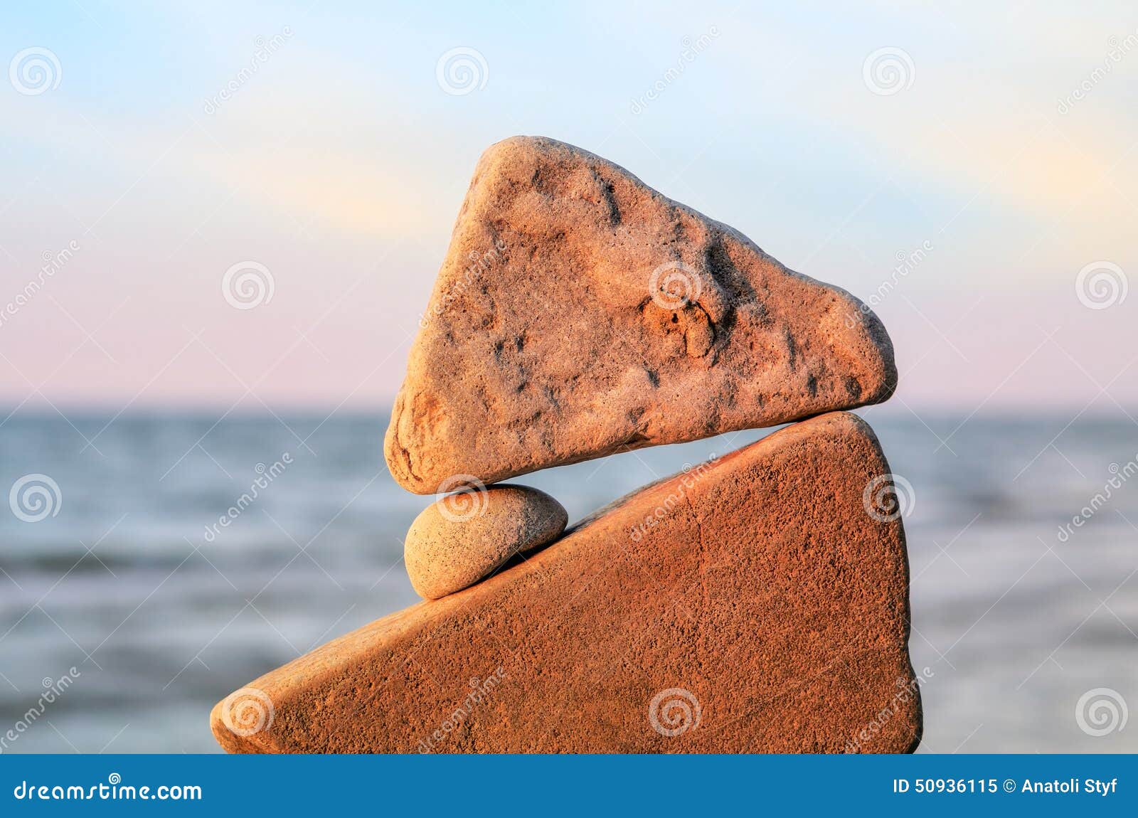 Balancing of round pebble stock image. Image of seashore - 50936115