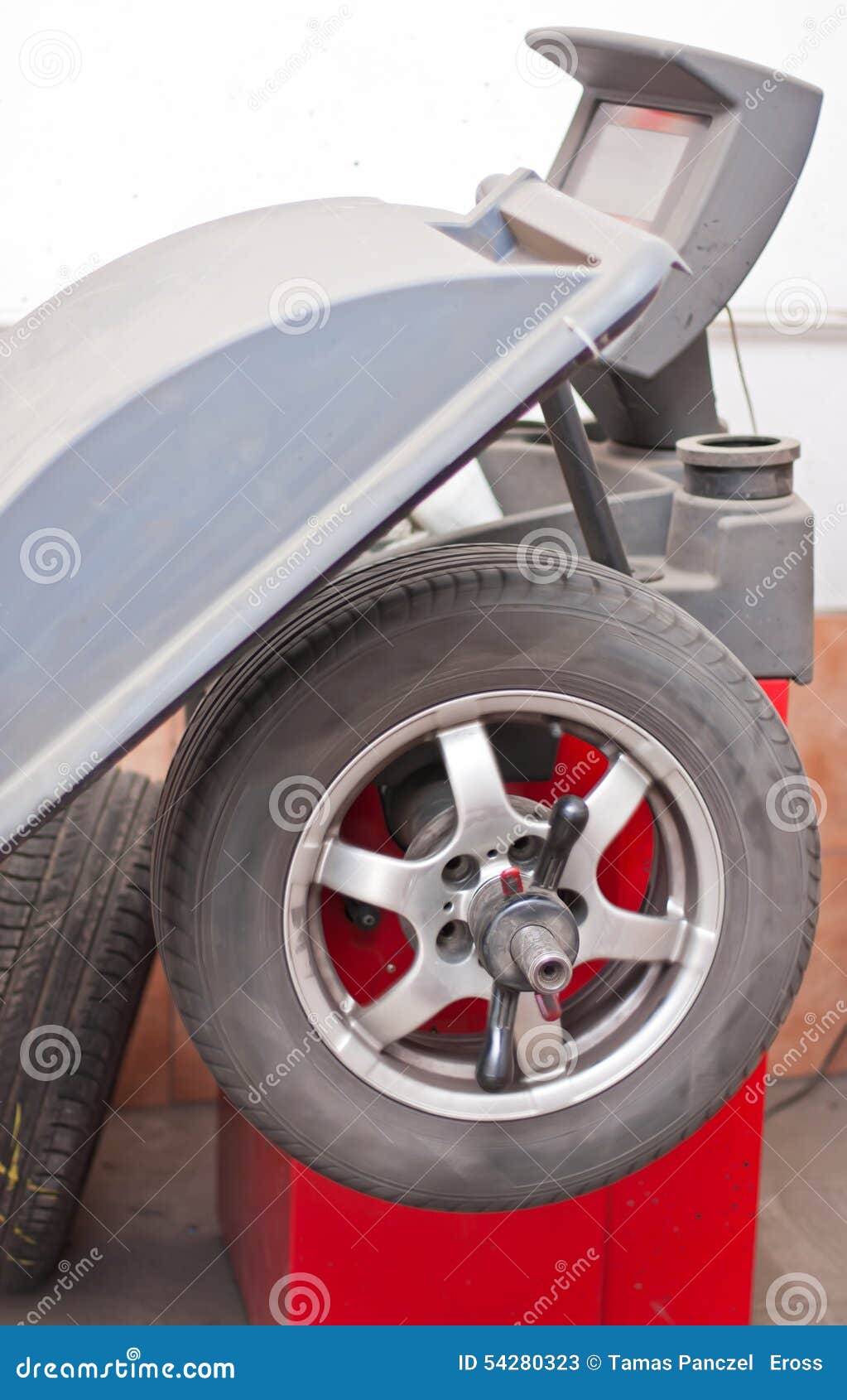 Balancing a Wheel in the Workshop Stock Image - Image of garage ...