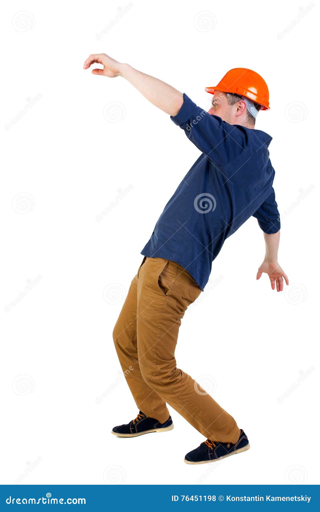 Balancing young man. stock photo. Image of uncertainty - 76451198