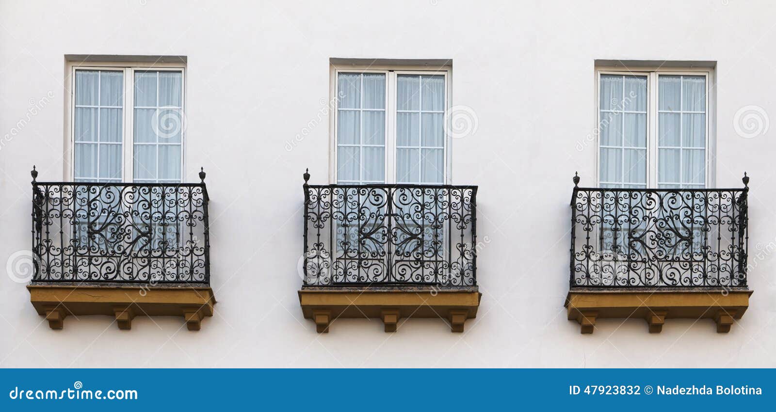 Balconies of a House in Seville Stock Photo - Image of arch, ornate ...
