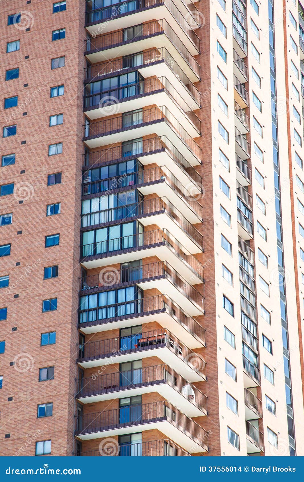 Balconies on Modern Brick High Rise Stock Photo - Image of condo, blue ...