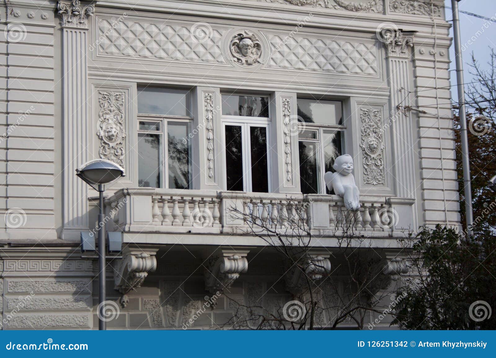 Balcony with Baby Angel Sculpture Stock Photo - Image of architecture ...