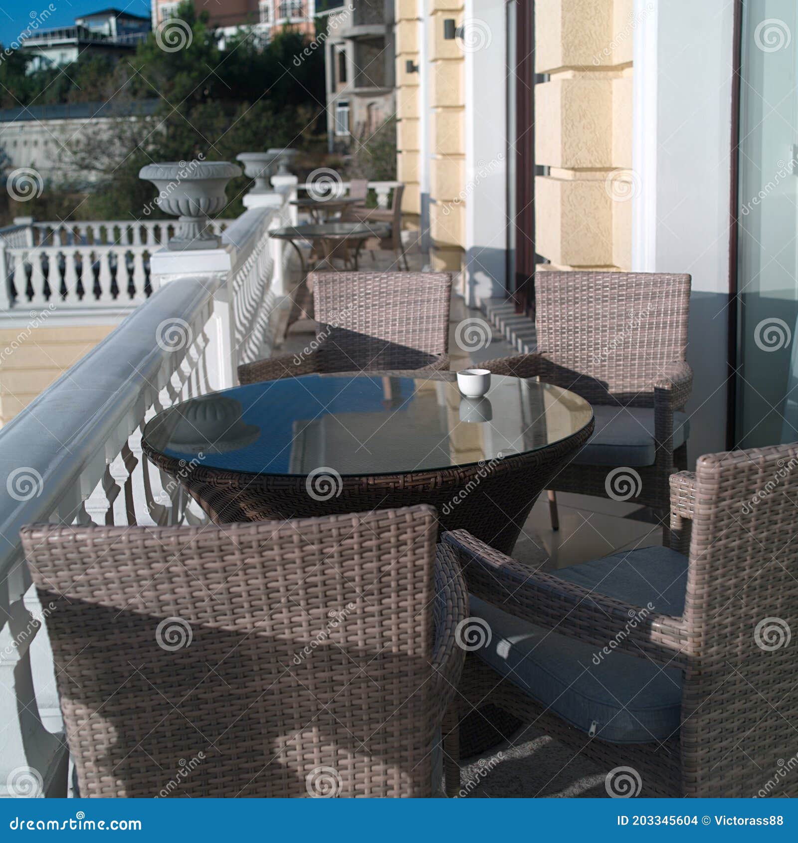 Drink coffee on a balcony stock photo. Image of cafeteria - 203345604