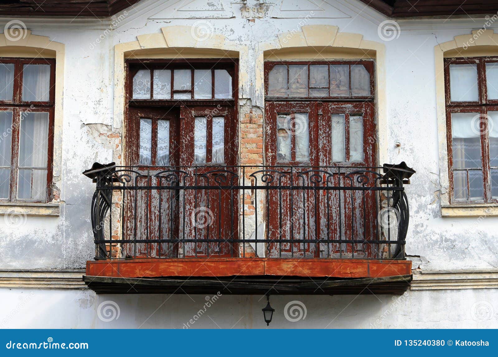 Balcony of an old house stock photo. Image of brick - 135240380