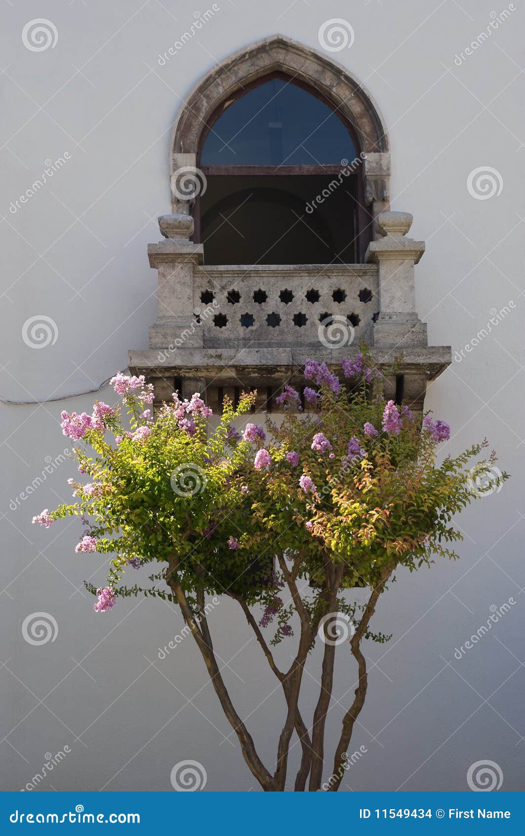 Balcony with Purple Flowers Stock Photo - Image of green, building ...