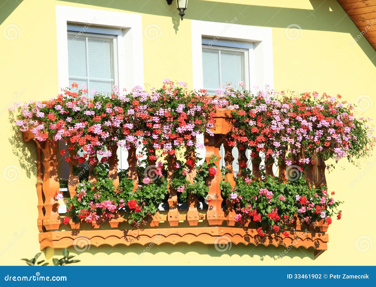 Balcony with Red and Pink Flowers Stock Photo - Image of brown, pink ...